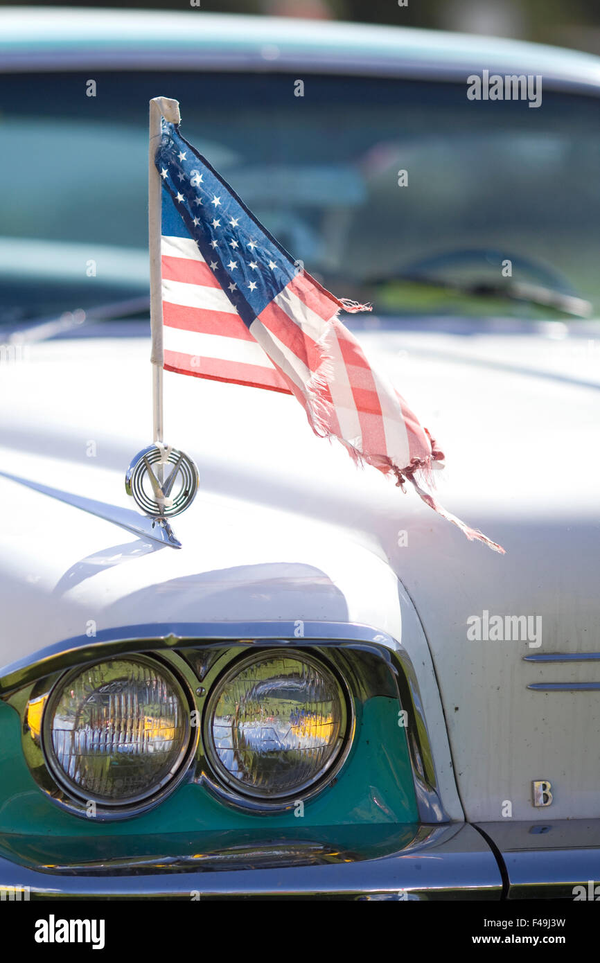 Torn flag of the United statues of America on a Chevrolet Stock Photo ...