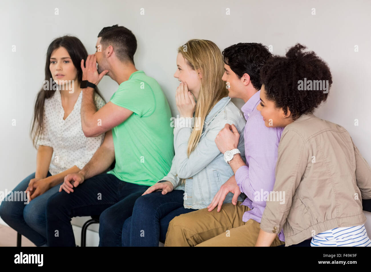Students gossiping in the hall Stock Photo - Alamy