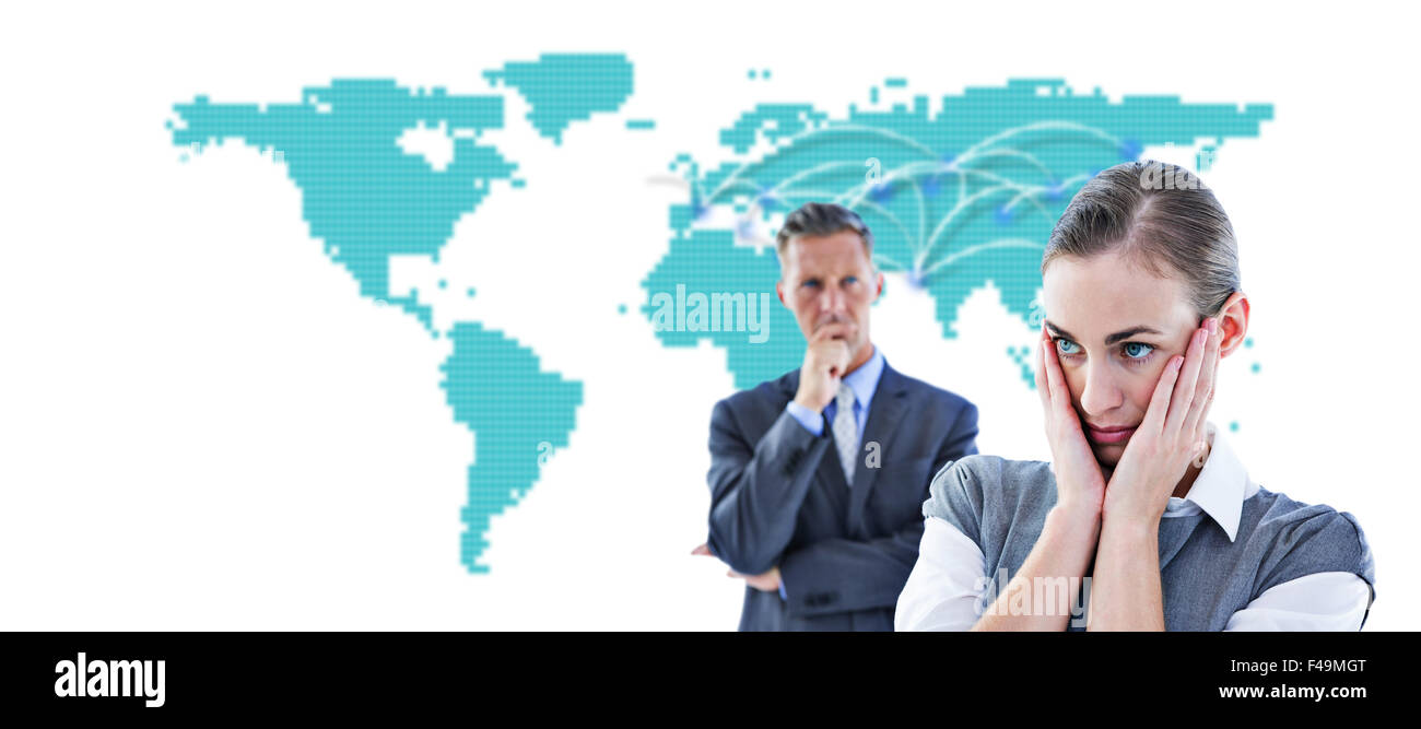 Composite image of business team thinking Stock Photo - Alamy