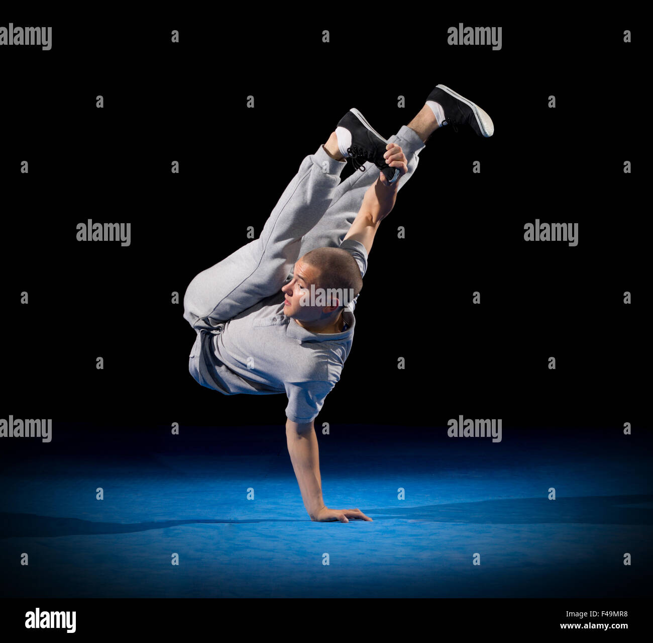 Breakdancer training on dark background Stock Photo - Alamy