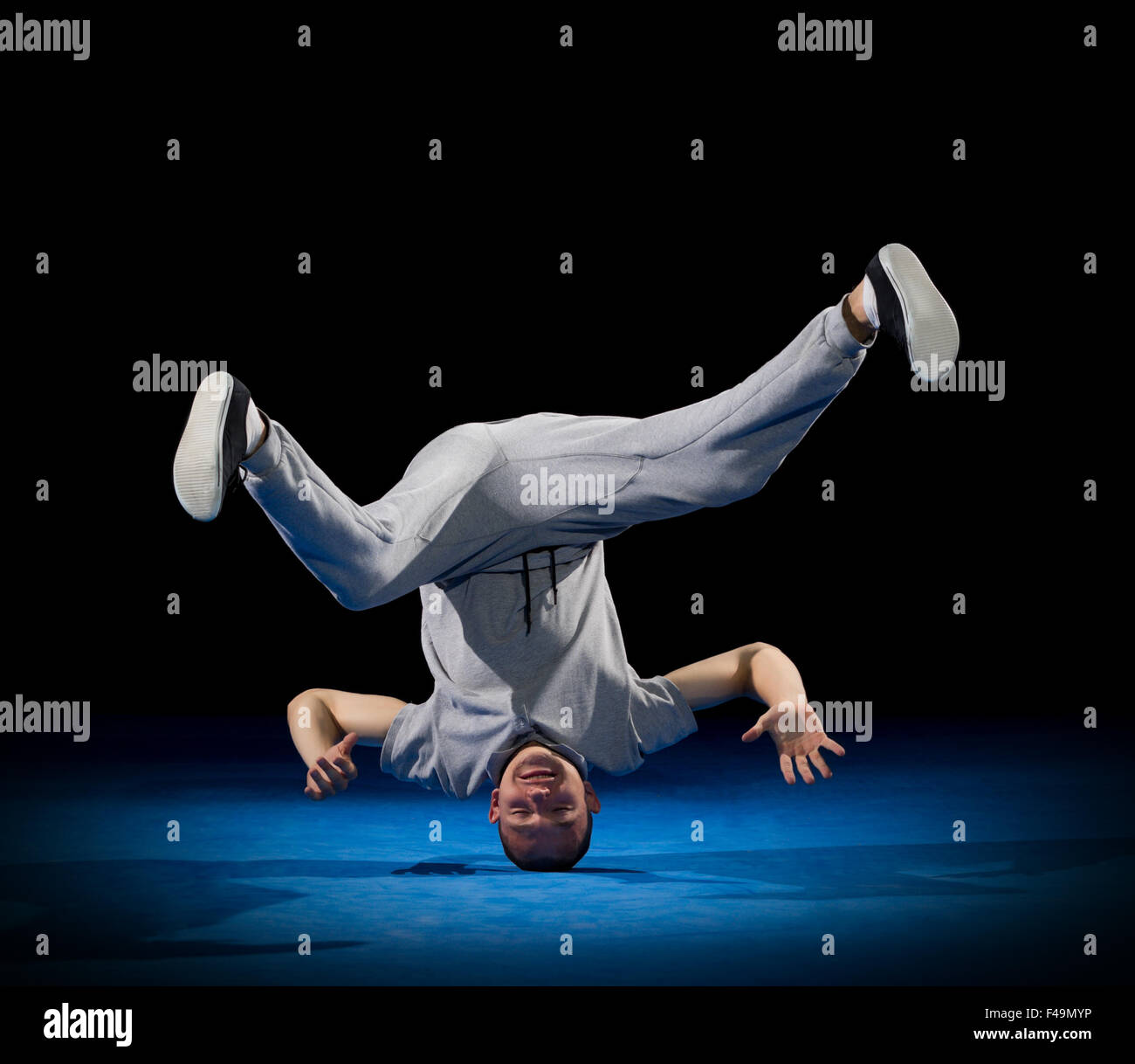 Breakdancer training on dark background Stock Photo - Alamy