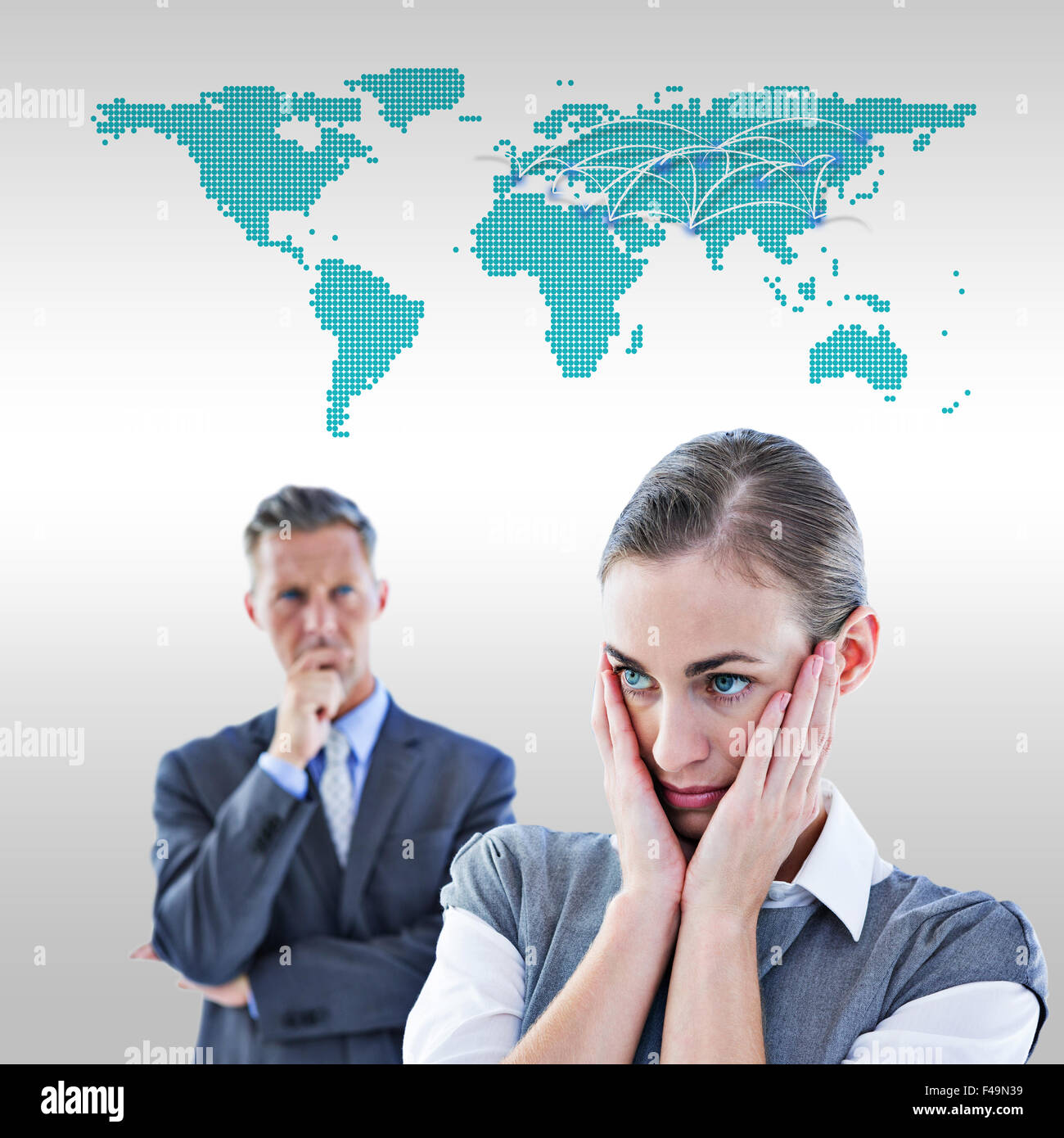 Composite image of business team thinking Stock Photo - Alamy