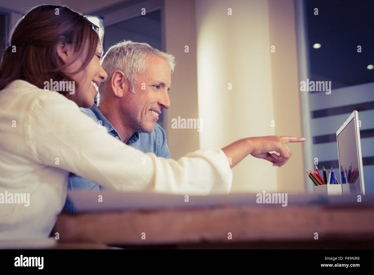 Pointing to laptop hi-res stock photography and images - Alamy