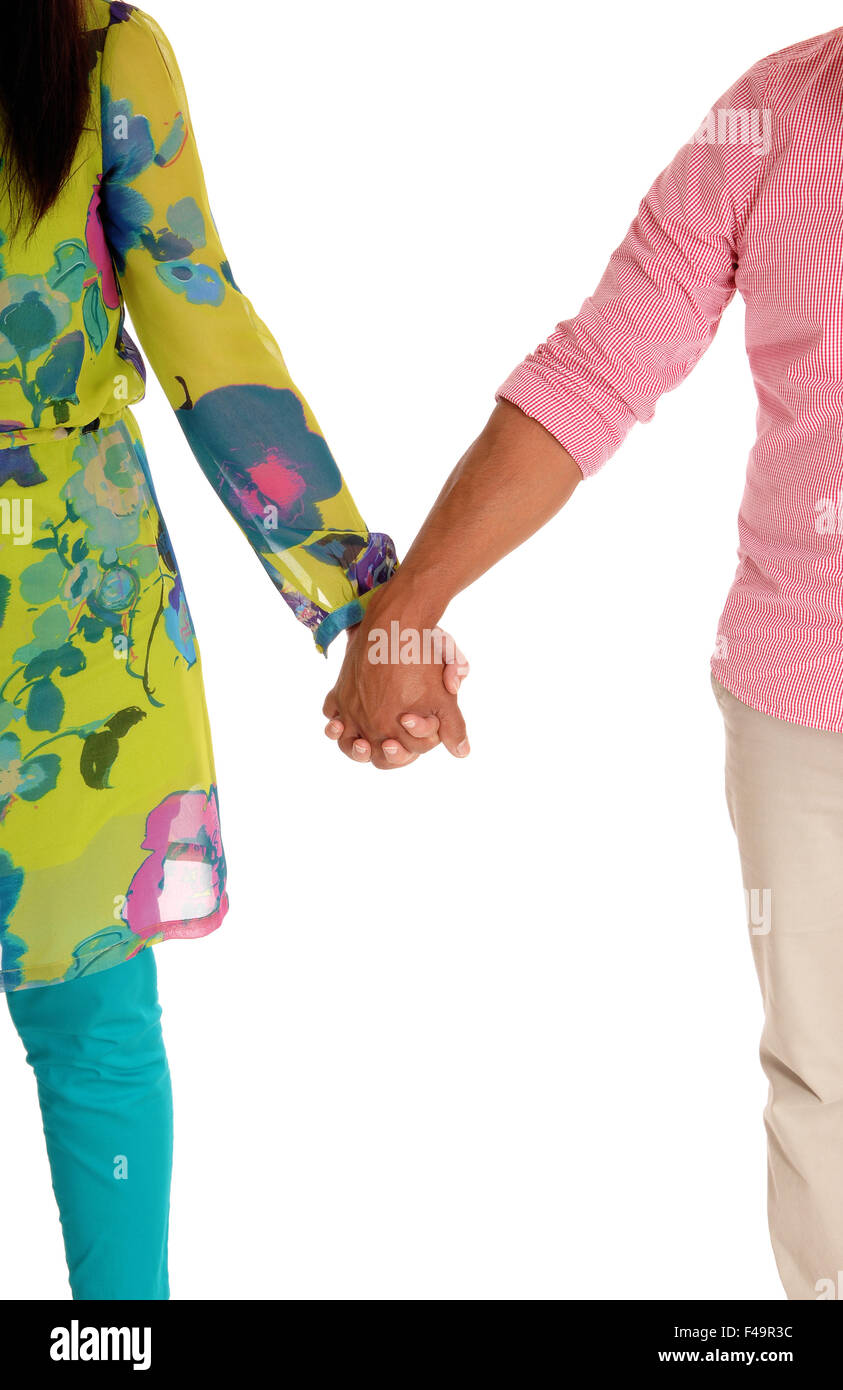 Couple walking hand in hand Stock Photo - Alamy
