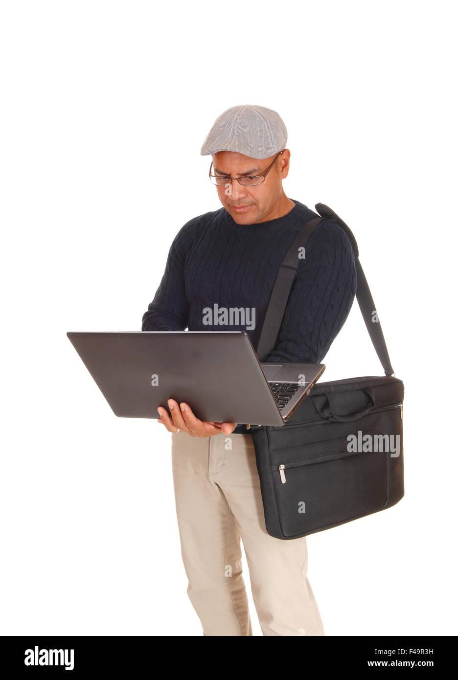 Hispanic man typing on laptop hi-res stock photography and images - Alamy
