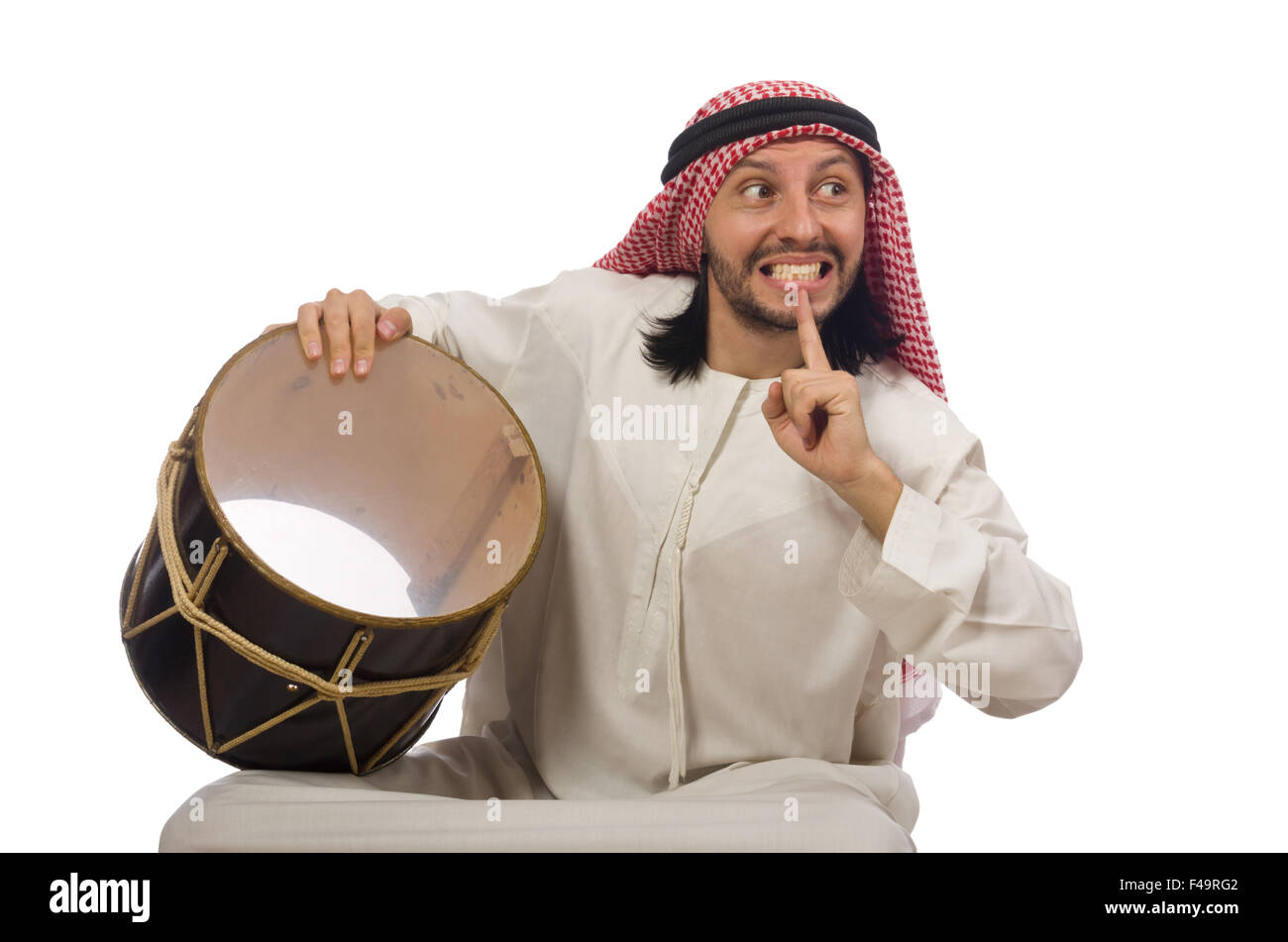 Arab man playing drum isolated on white Stock Photo - Alamy