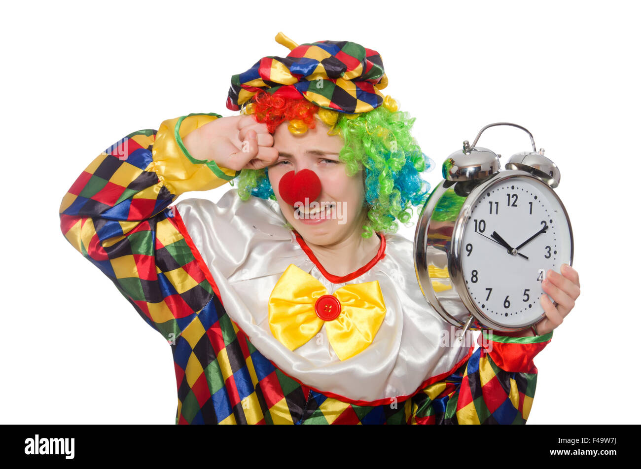 Clown with clock isolated on white Stock Photo - Alamy