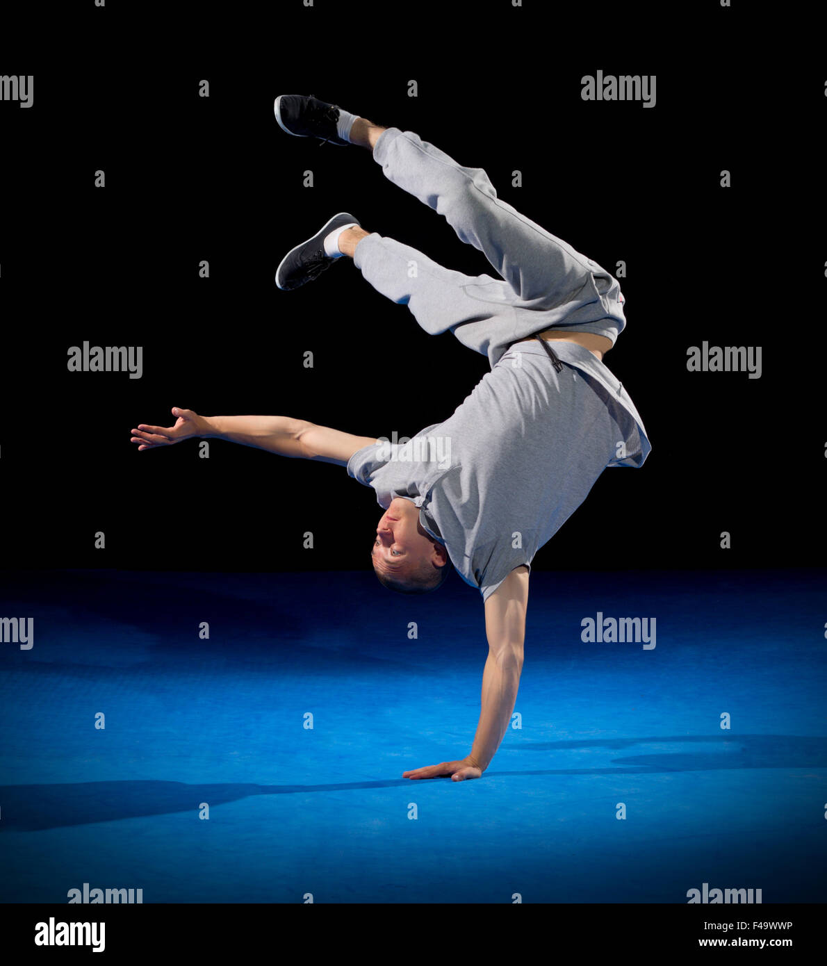 Break dancer training on black Stock Photo - Alamy
