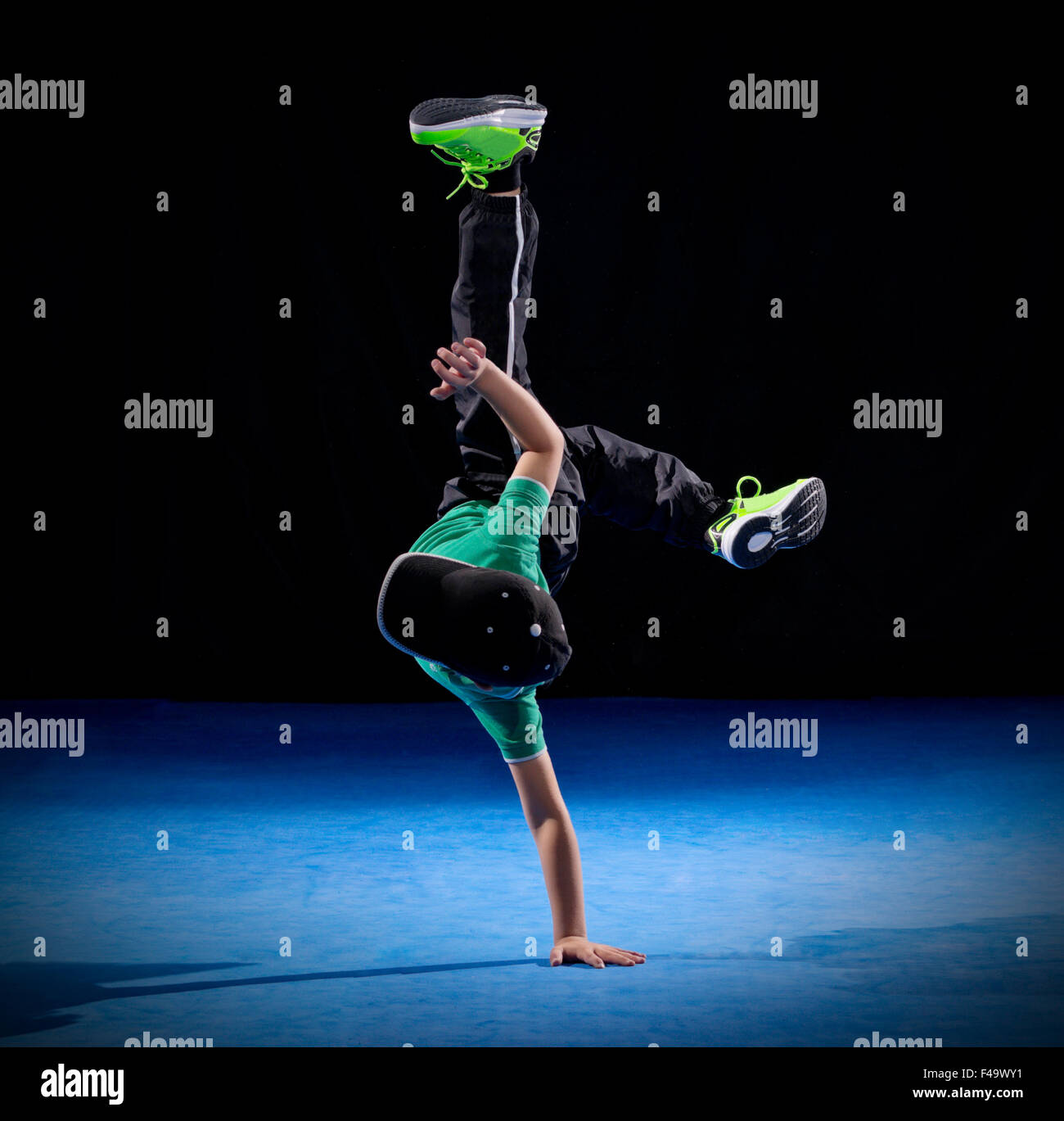 Little boy break dancer on black Stock Photo - Alamy