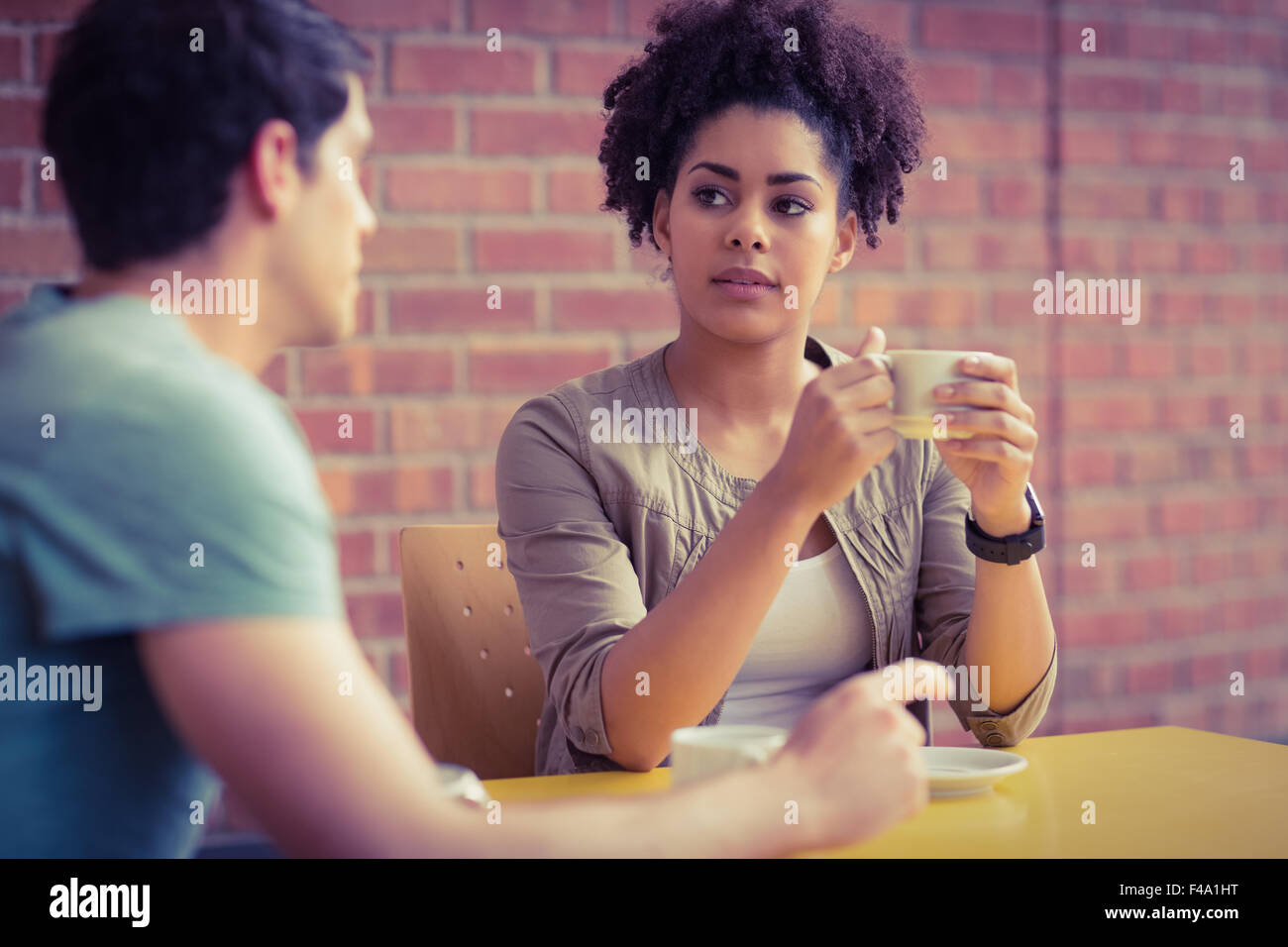 Students chatting in the cafe Stock Photo - Alamy