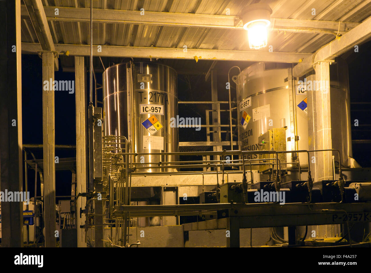 Chemical vats at an oil well with injector equipment, in the Ecuadorian ...