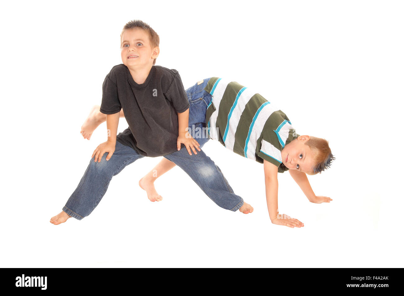 Two little boy's dancing on the floor Stock Photo - Alamy