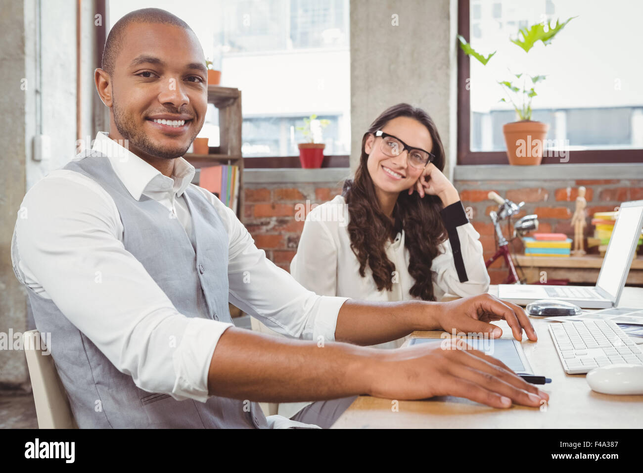 People smiling at office Stock Photo - Alamy