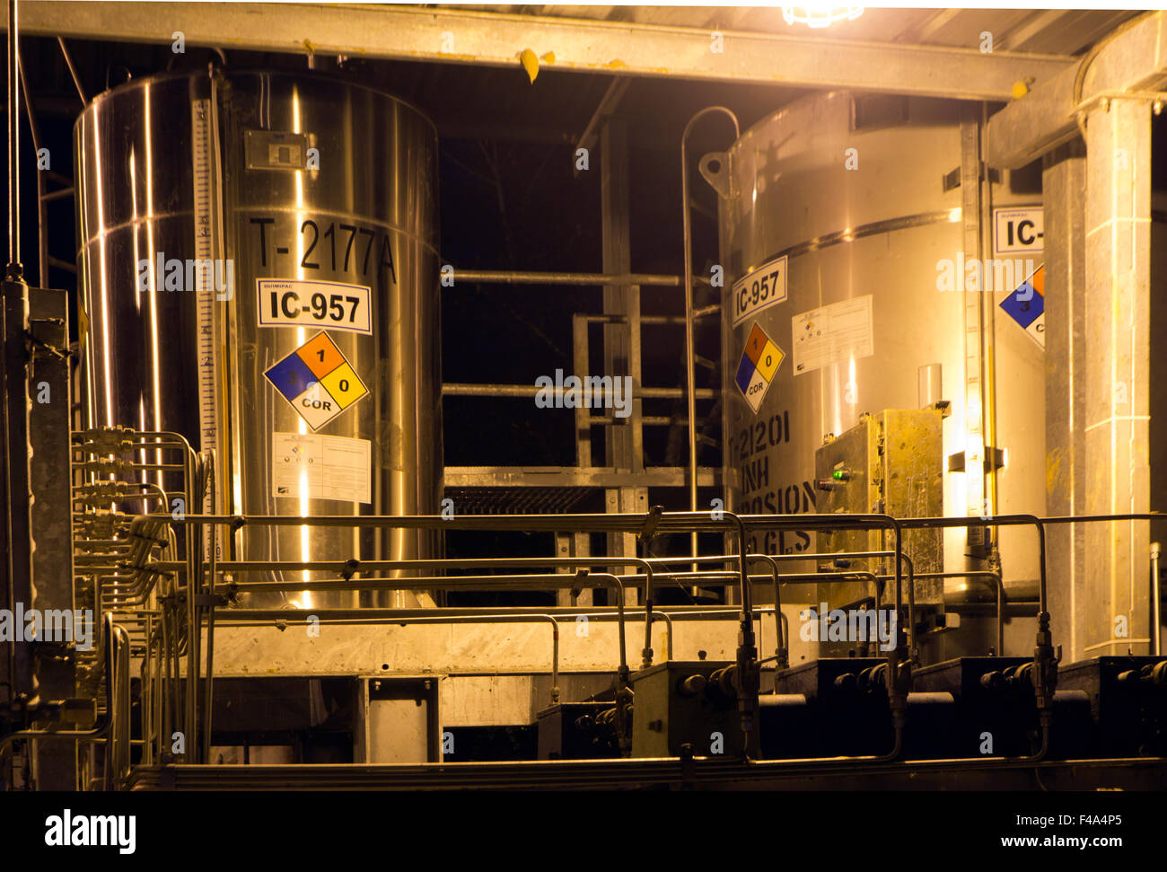 Chemical vats at an oil well with injector equipment, in the Ecuadorian ...