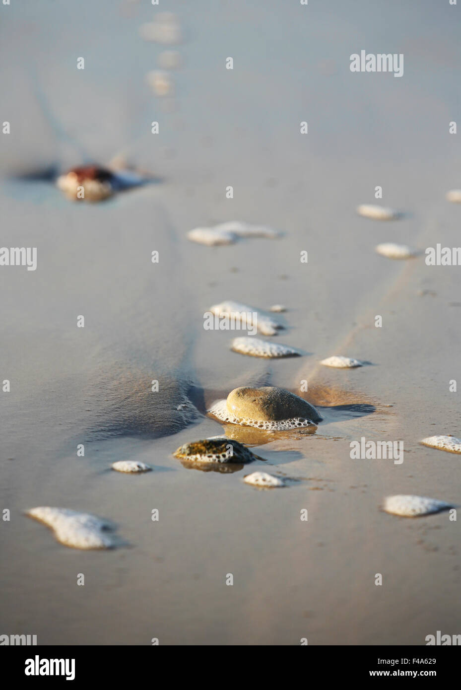 Wet stones and sand hi-res stock photography and images - Alamy
