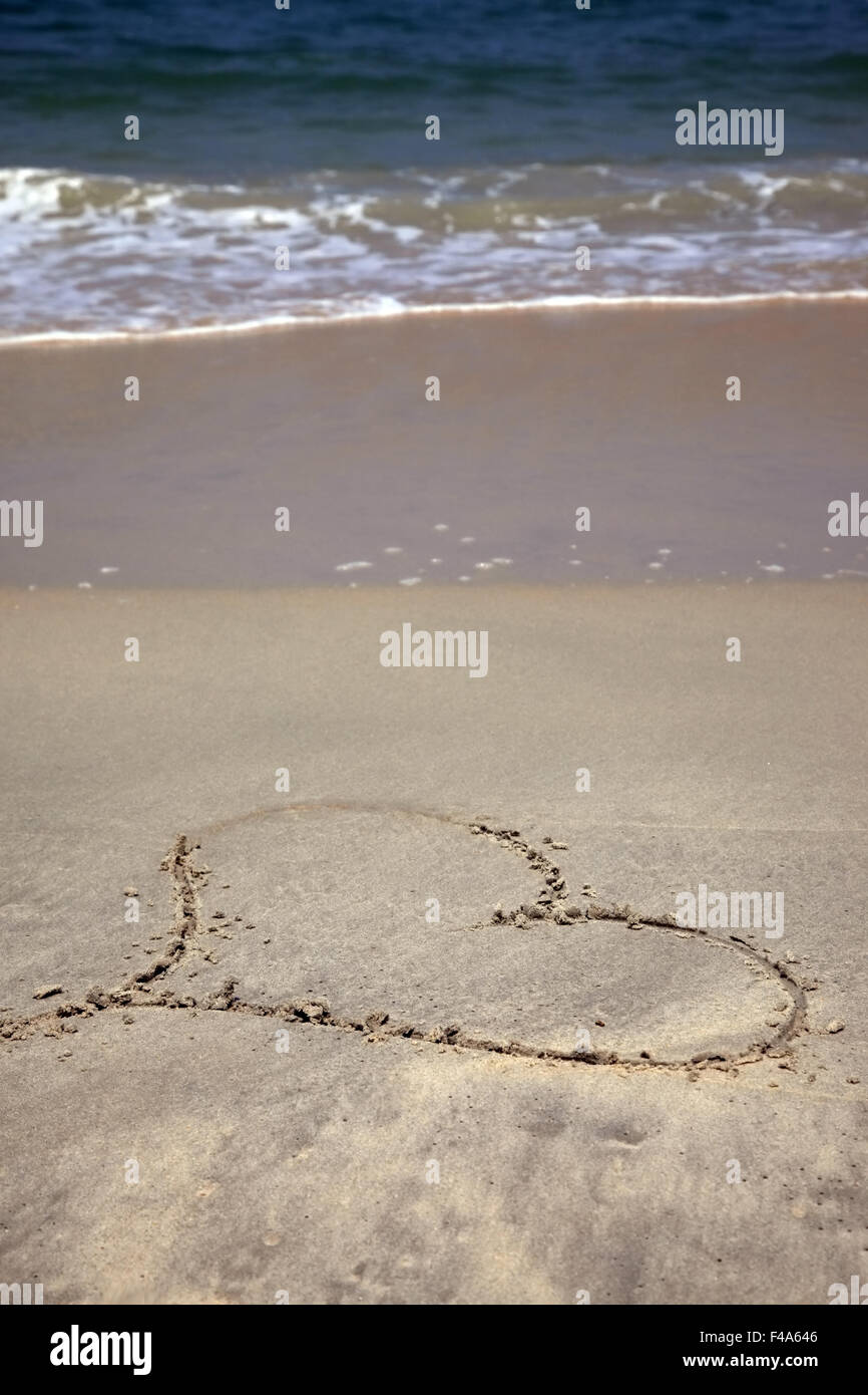 Heart on sand Stock Photo - Alamy