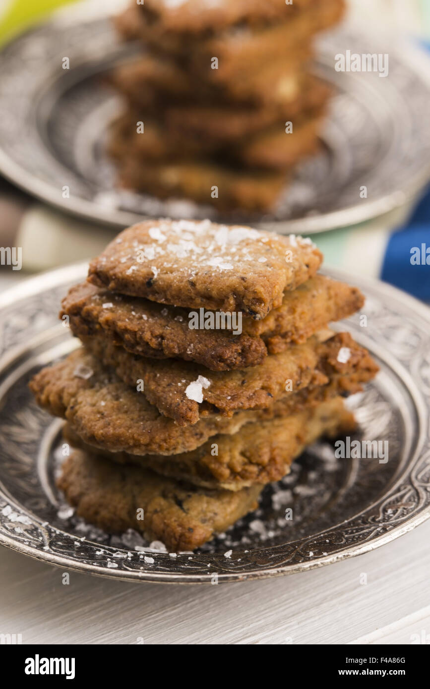 spanish snack crackers with black olives and anchois Stock Photo - Alamy