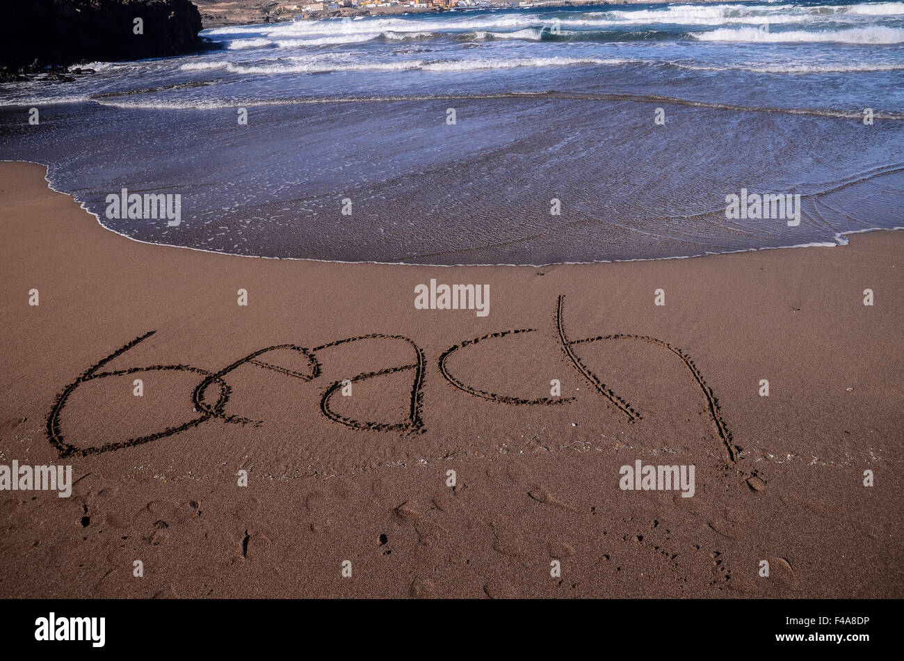 Word Written on the Sand Stock Photo - Alamy