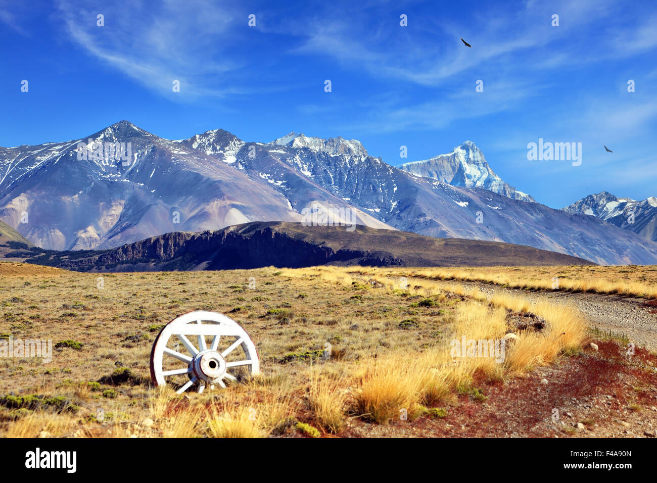 Road sign in the form of a wagon wheel Stock Photo - Alamy