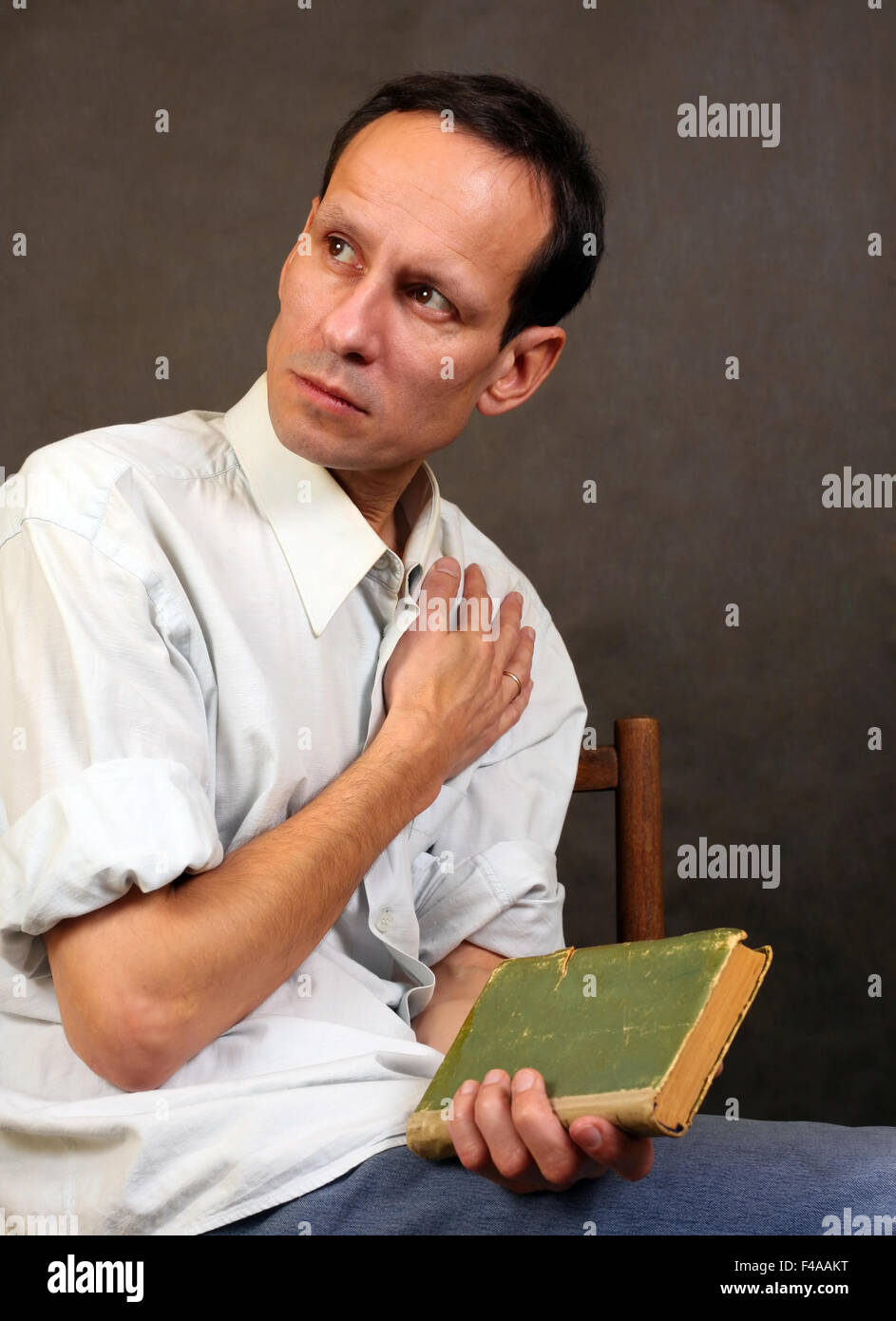 Man with the book Stock Photo - Alamy