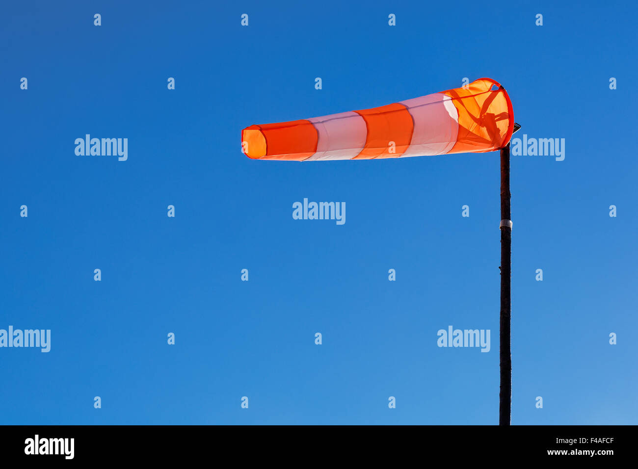Windsock with blue sky Stock Photo - Alamy