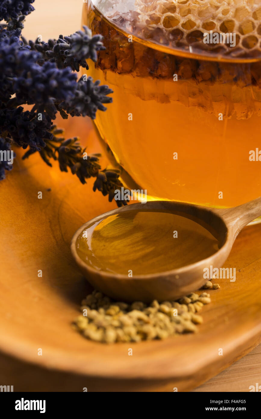 Lavender honey with bee pollen and honey comb Stock Photo - Alamy
