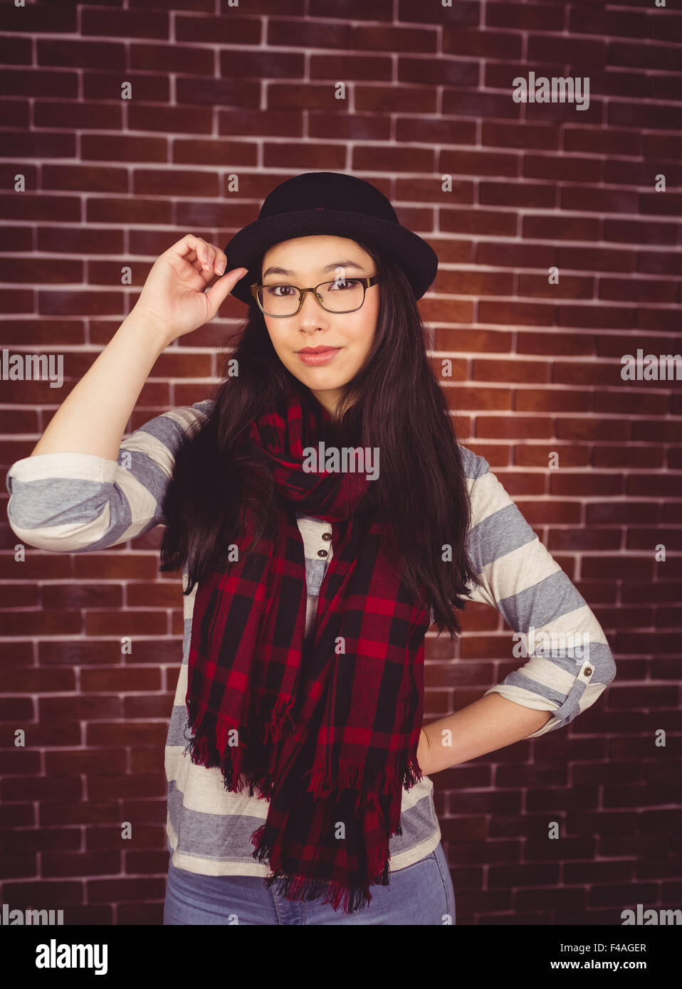 Attractive hipster smiling at the camera Stock Photo - Alamy