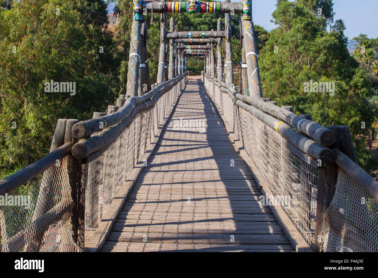 Wooden bridge made of trunks in the middle of the jungle Stock Photo ...