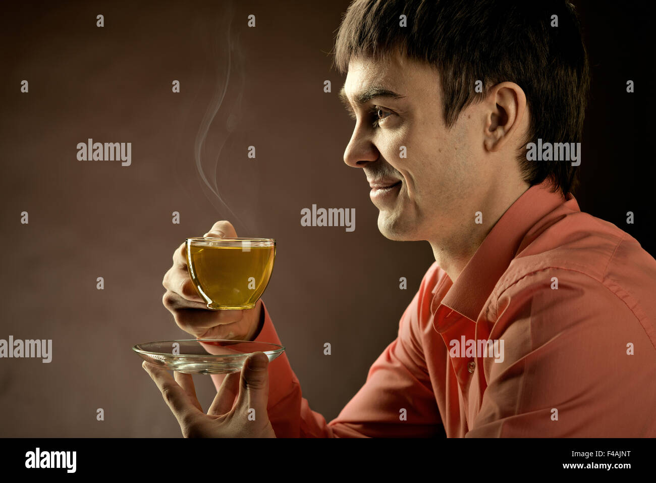 beautiful man with tea Stock Photo - Alamy