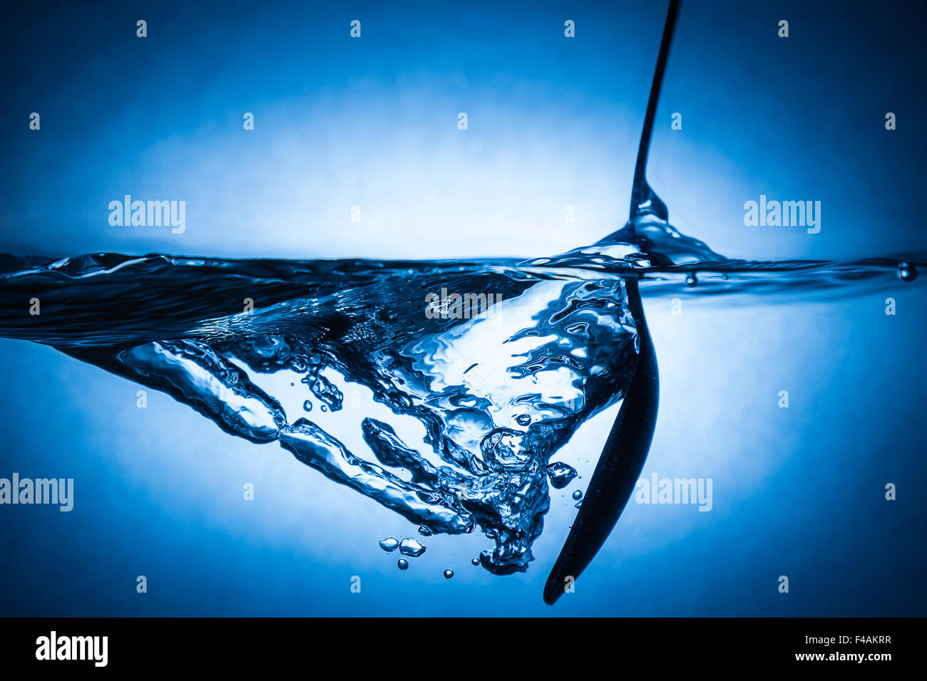 Water refraction spoon hi-res stock photography and images - Alamy