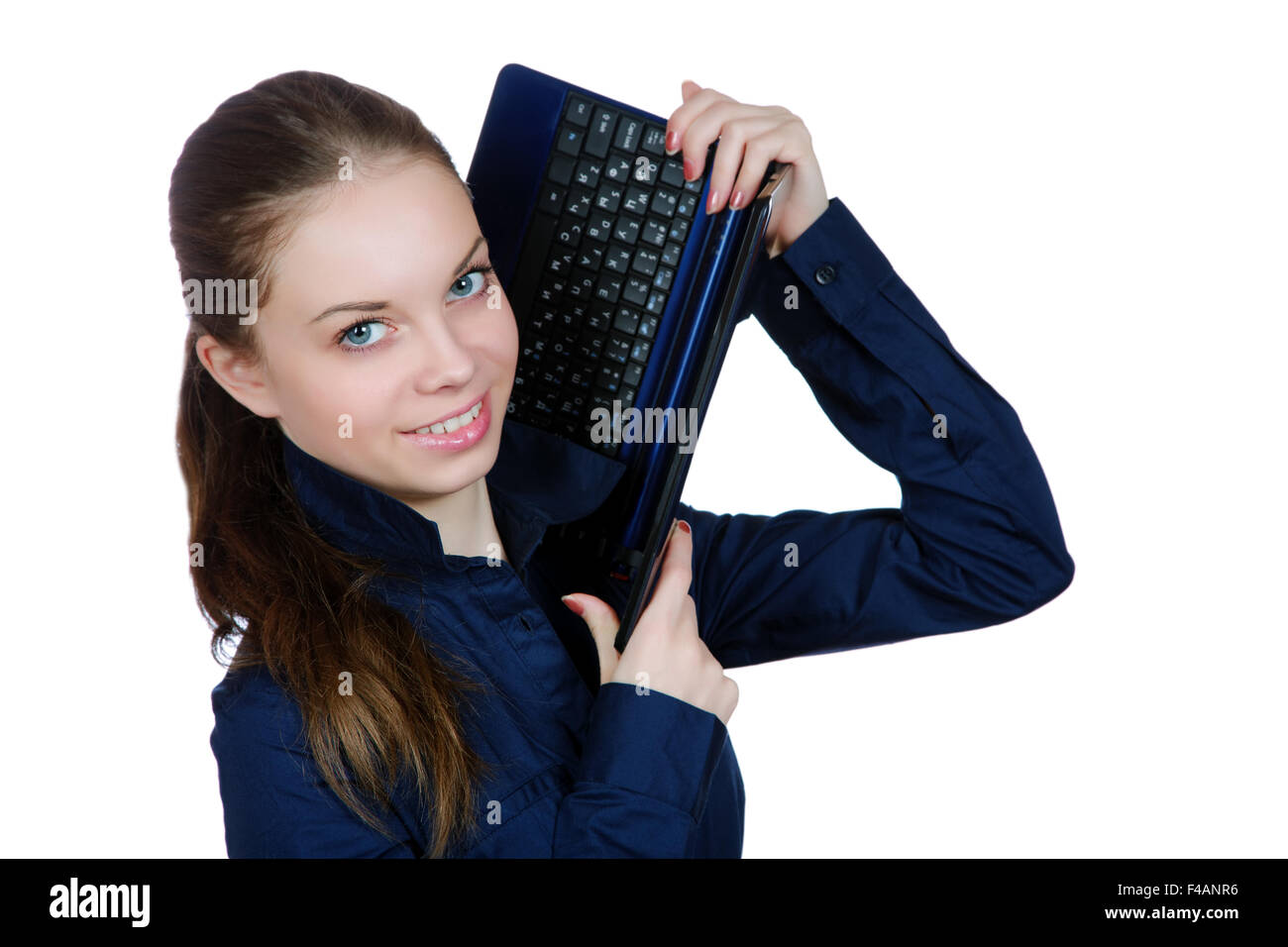 The smiling girl with the laptop in hands Stock Photo - Alamy
