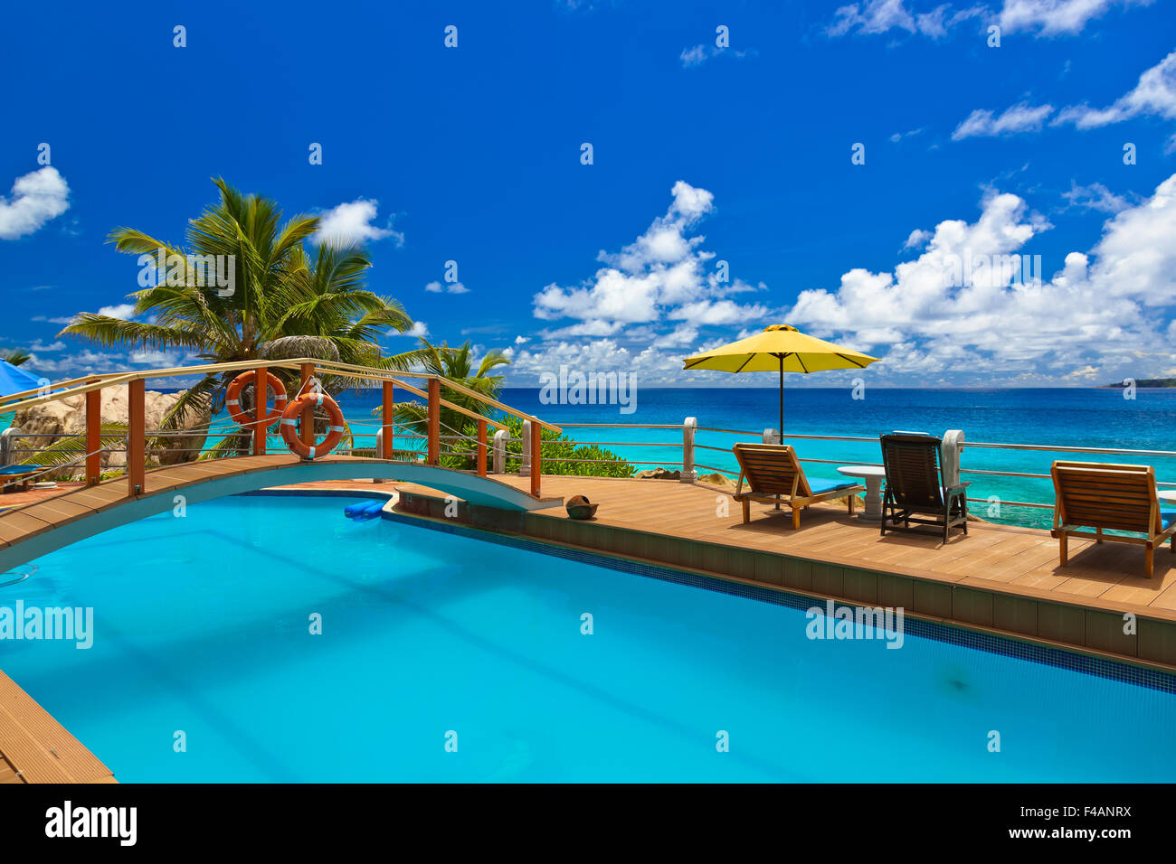 Pool at tropical beach - Seychelles Stock Photo - Alamy