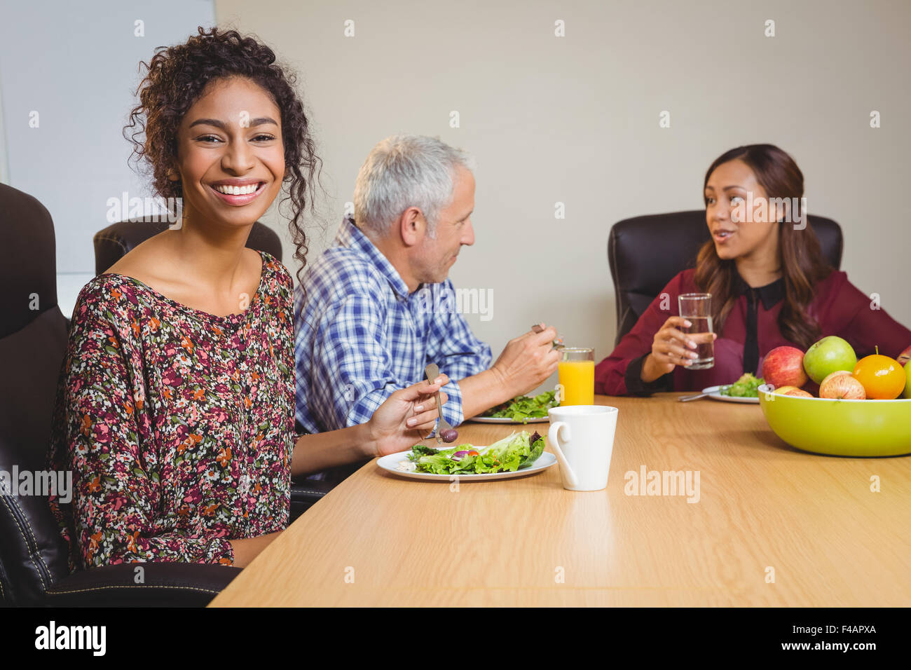 Happy businesswoman having breakfast Stock Photo - Alamy
