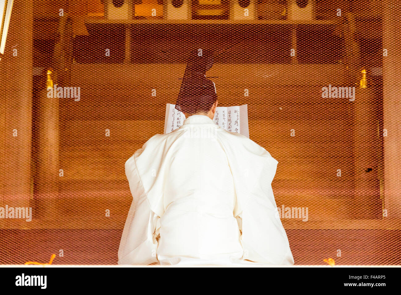 Nishinomiya shrine, Japan. View through screen of a Priest, kannushi ...