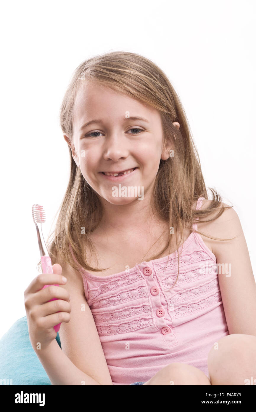Girl brushing teeth tooth missing hi-res stock photography and images ...