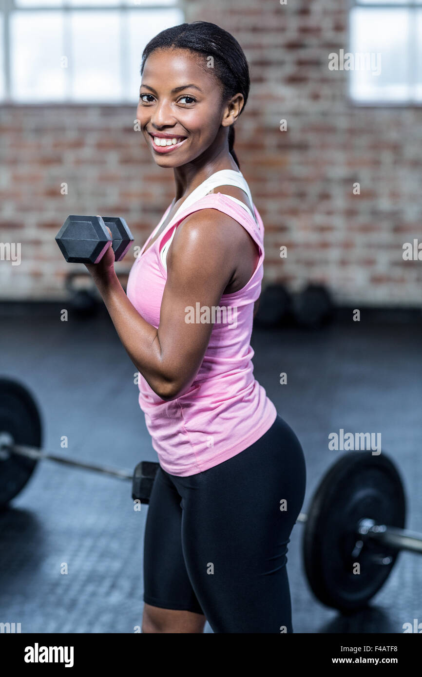 Fit smiling woman doing some exercise Stock Photo - Alamy
