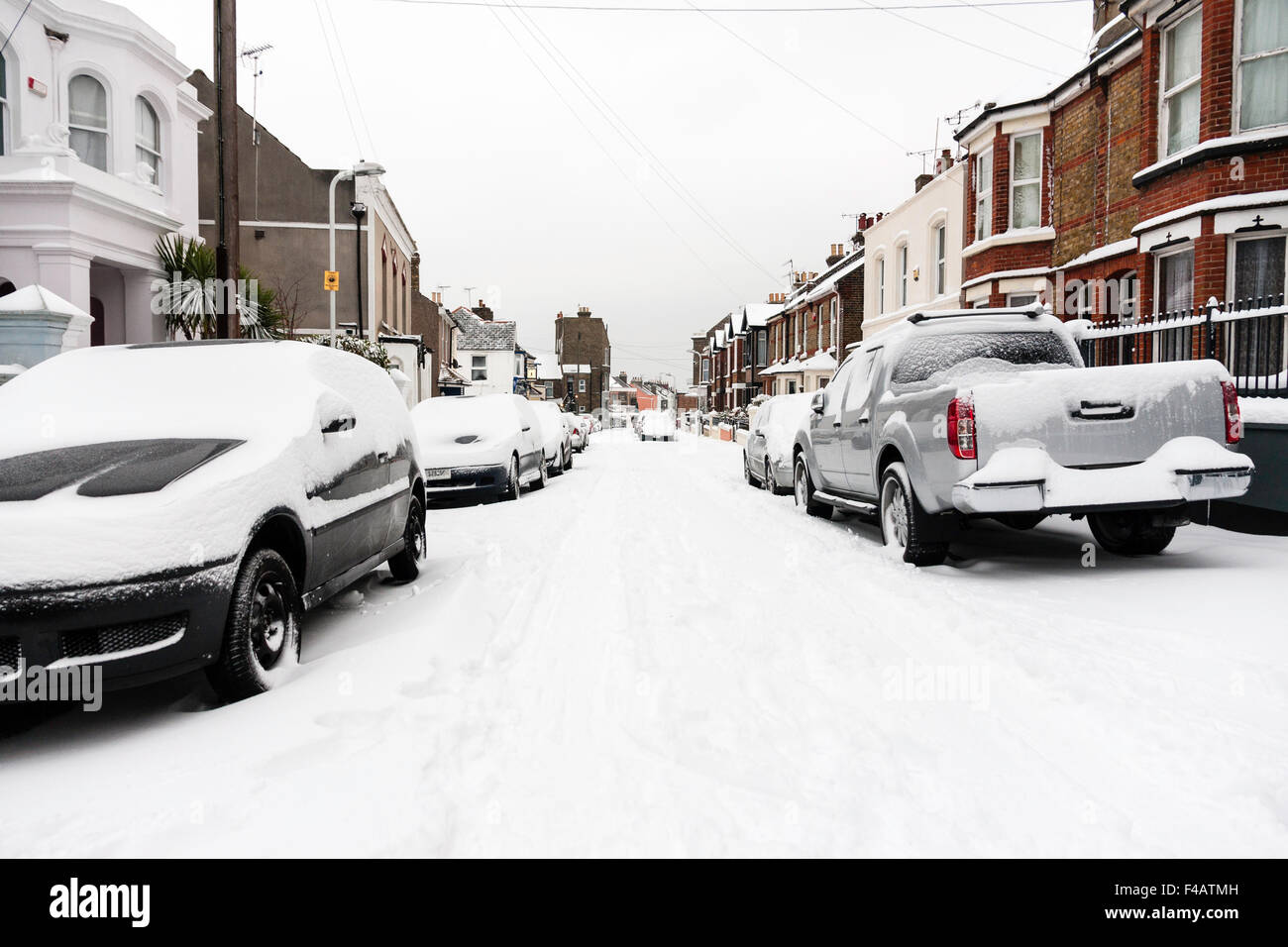 Bad weather, Ramsgate, in England. Snow covered cars parked in English ...