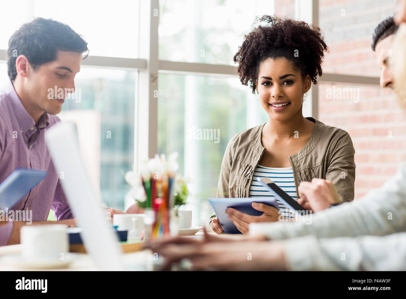 Group of students working on assignments Stock Photo - Alamy