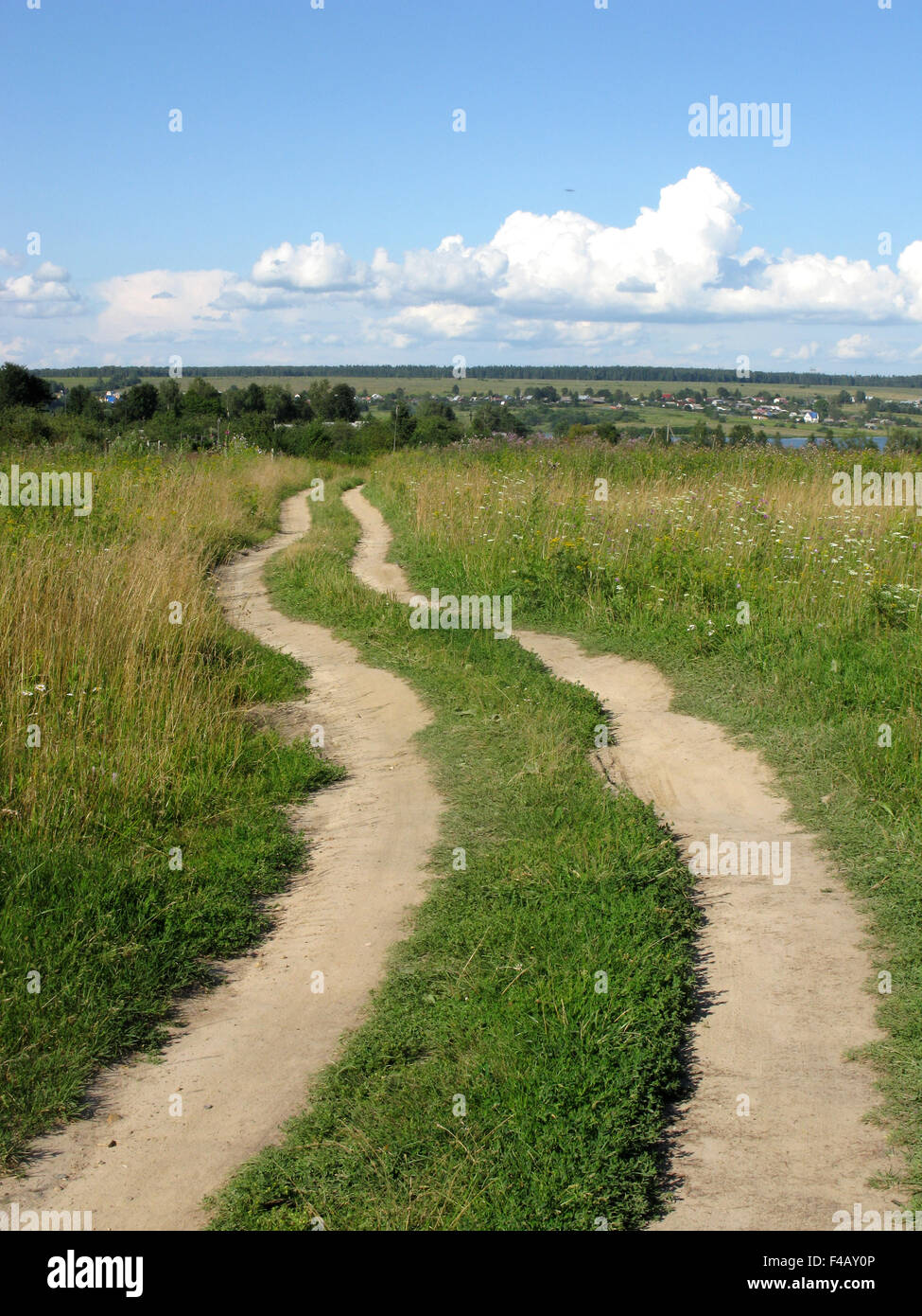 Country earth road to the river Stock Photo - Alamy