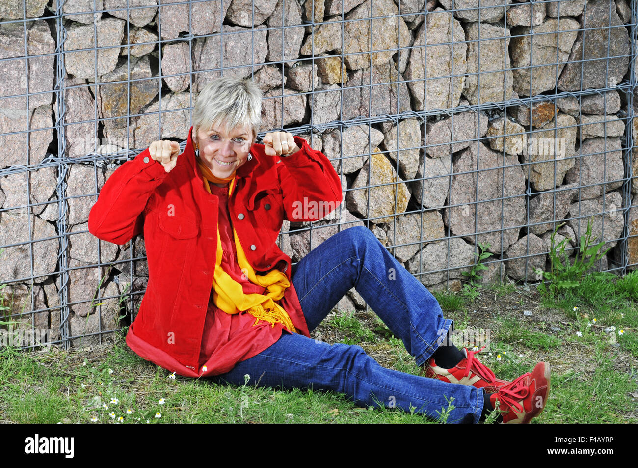 posing at the wall Stock Photo - Alamy