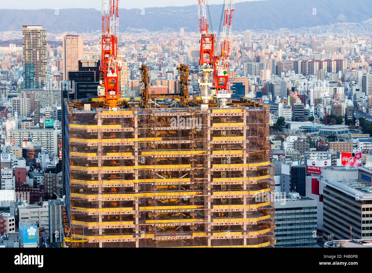 Japan, Osaka, view from Umeda Sky Building, Office block being ...