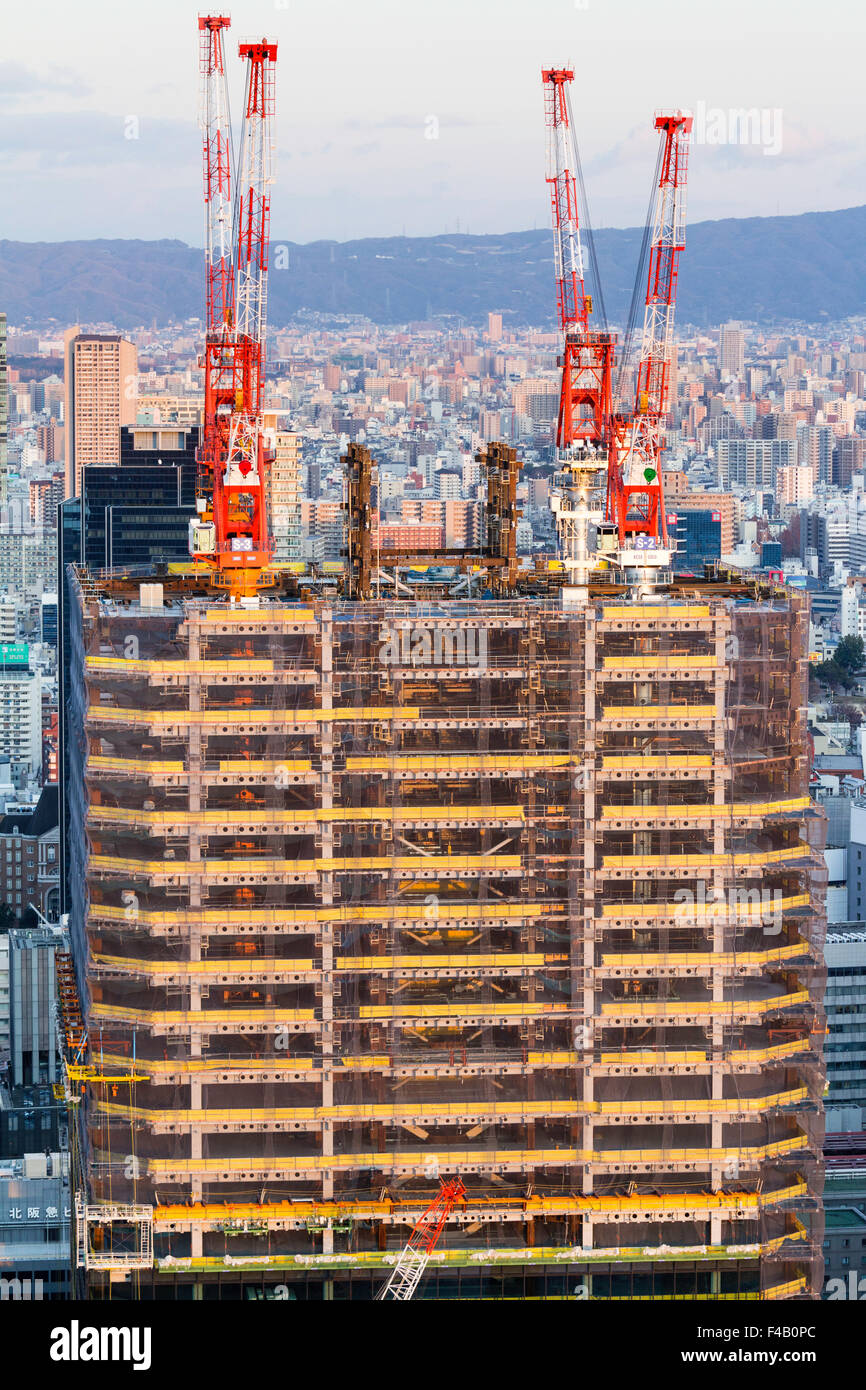 Japan, Osaka, view from Umeda Sky Building, Office block being ...