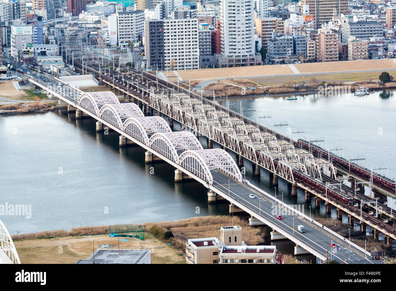 Japan, Osaka, Aerial view from Umeda Sky Building, daytime. Juso Bridge ...