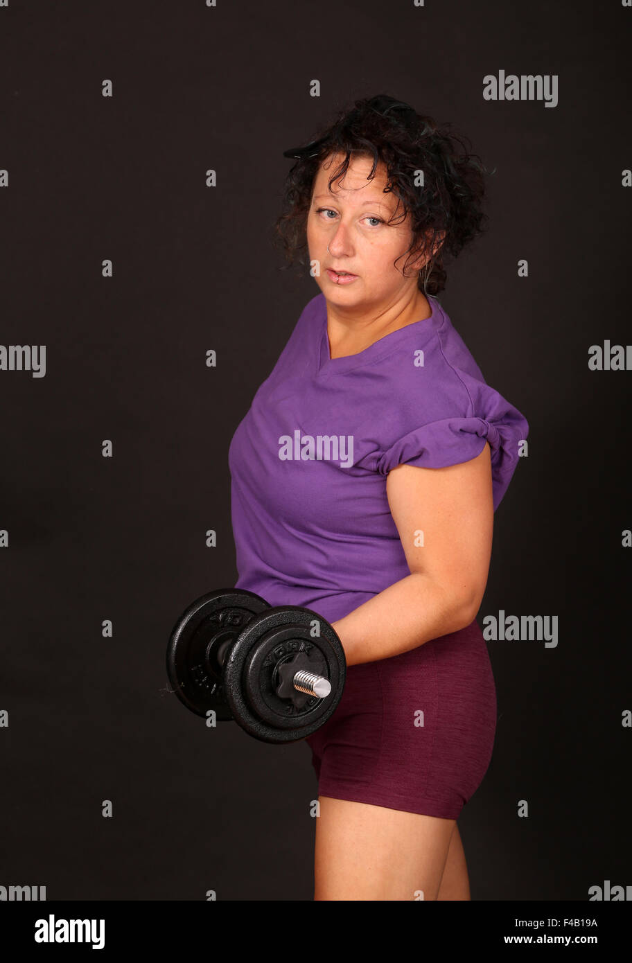 Female boxer in the studio, with British union flag celebrating a ...