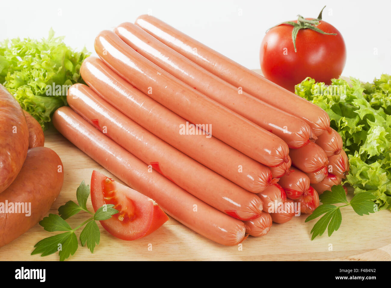 stack of sausages on cutting board Stock Photo - Alamy