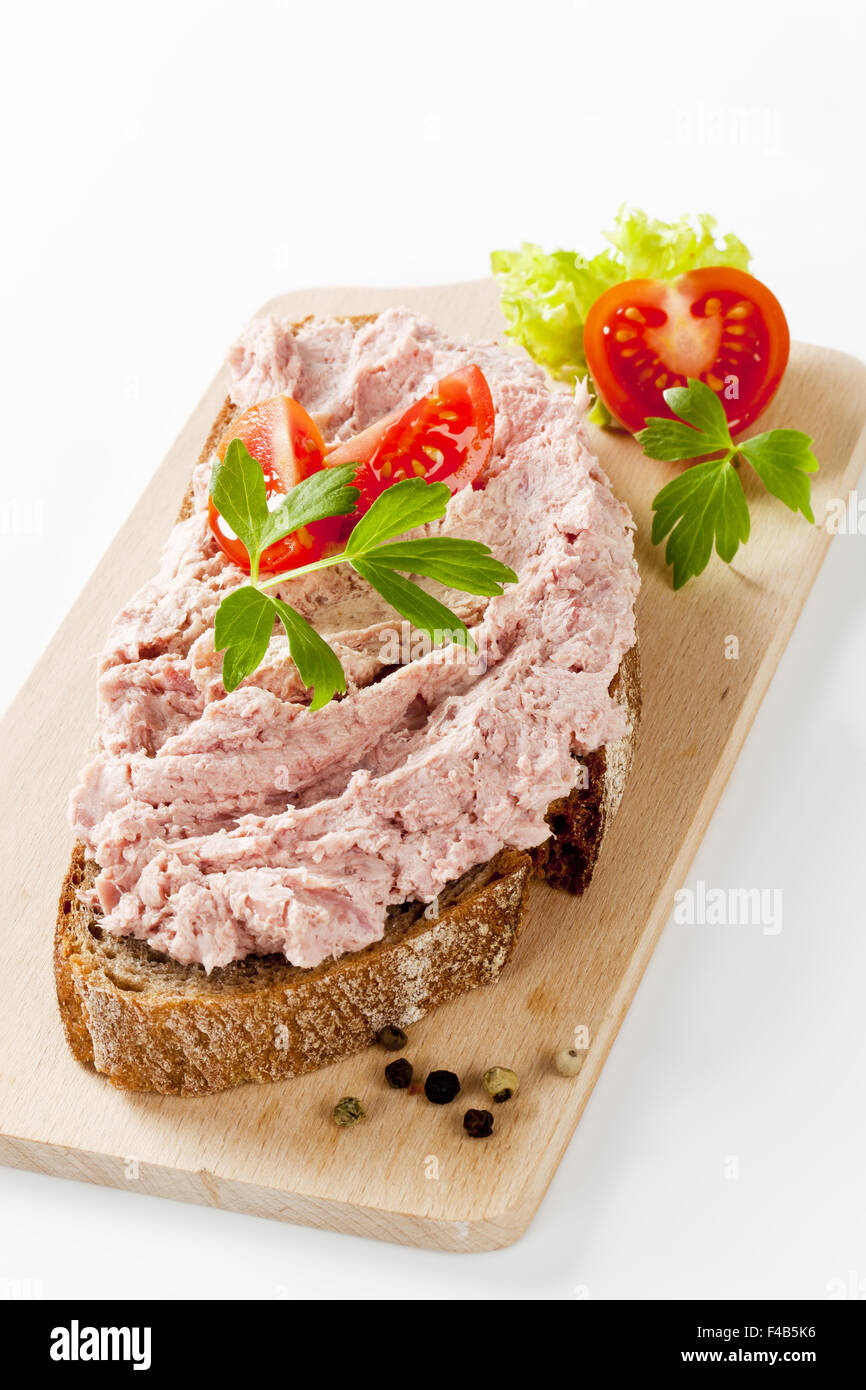 slice of bread with ham spread Stock Photo - Alamy