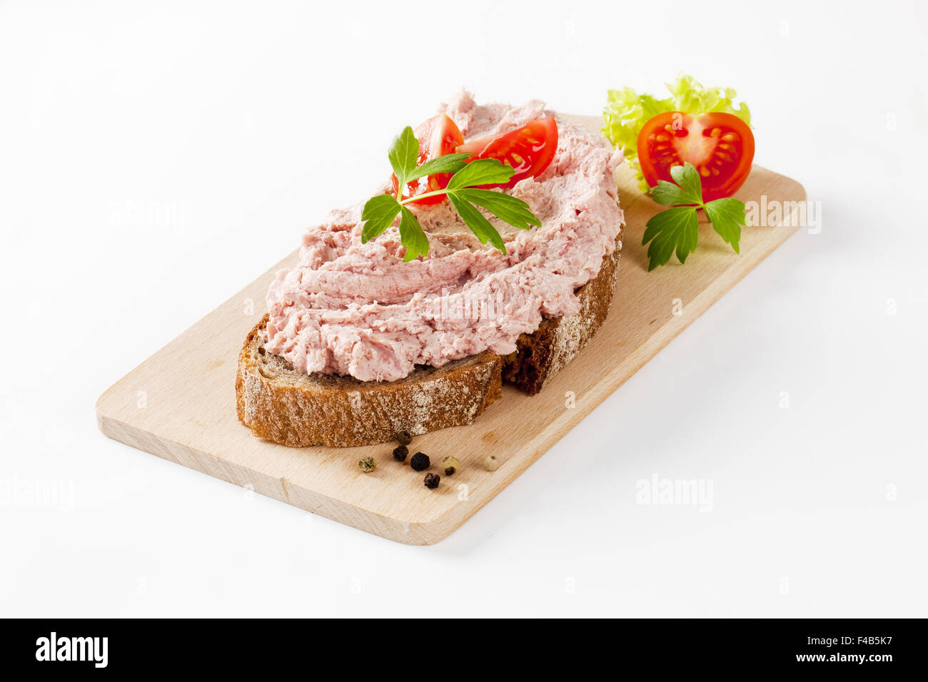 slice of bread with ham spread Stock Photo - Alamy