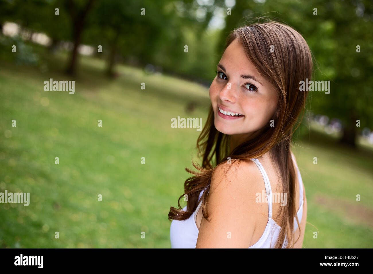 headshot of a cute young woman Stock Photo - Alamy