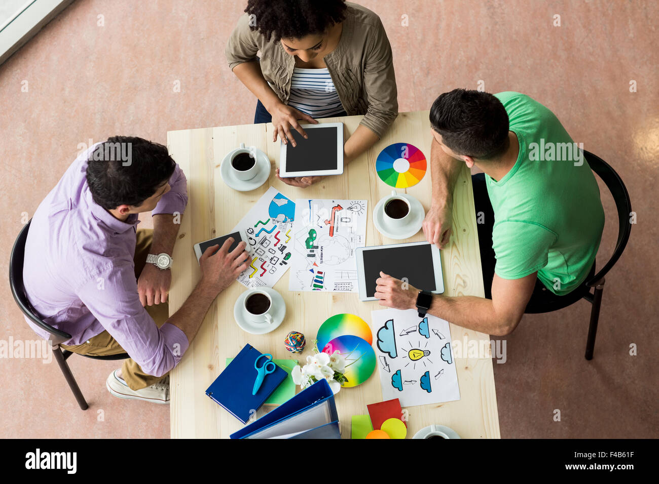 Overhead of students working together Stock Photo - Alamy