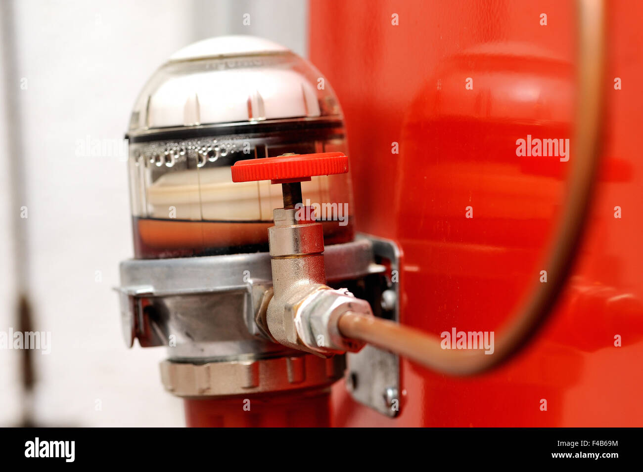 oil filter of an heating installation Stock Photo - Alamy